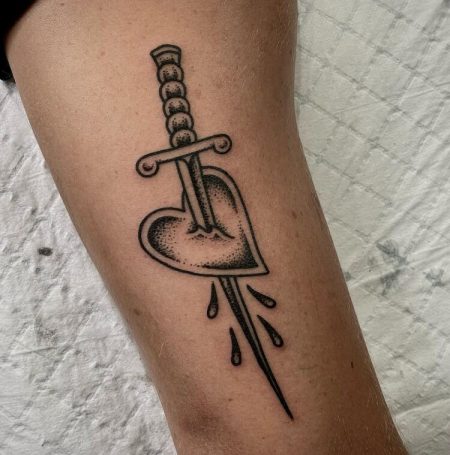 Dagger and Heart Tattoo: Meaning, Origins, and 50 Beautiful Ideas