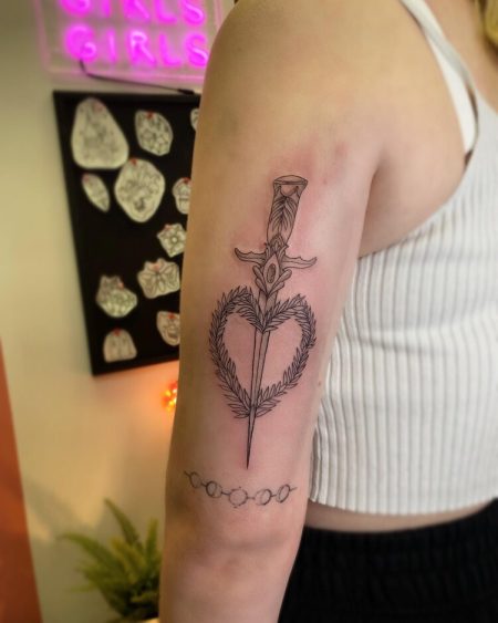 Dagger and Heart Tattoo: Meaning, Origins, and 50 Beautiful Ideas